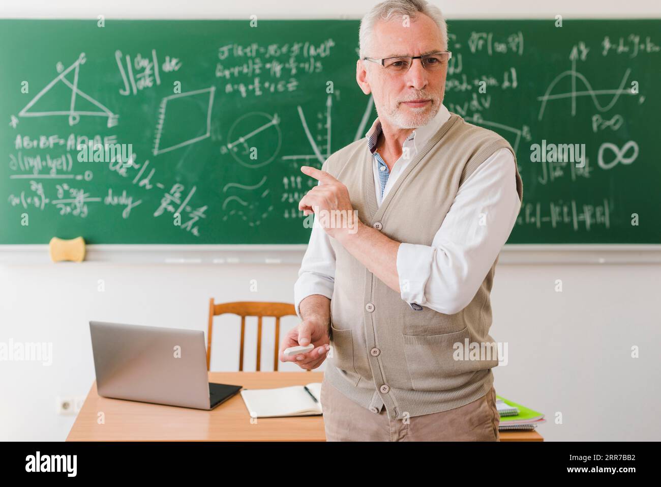 Old professor showing classroom Stock Photo - Alamy