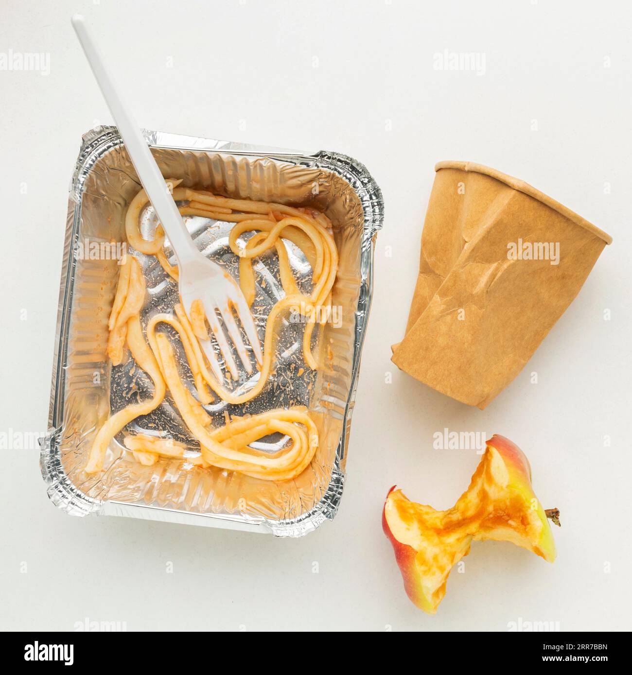 Pasta apple leftover food waste Stock Photo - Alamy