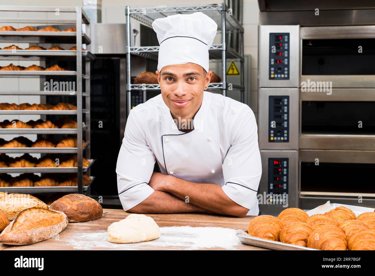 Portrait young male baker hi-res stock photography and images - Alamy