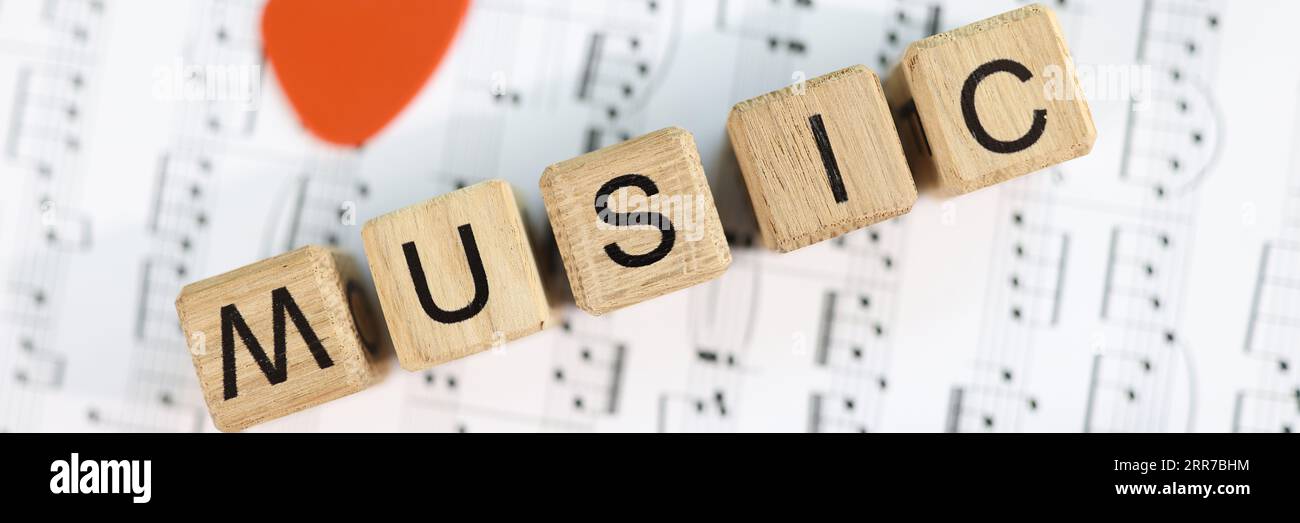 Musical word from wooden cubes hi-res stock photography and images - Alamy