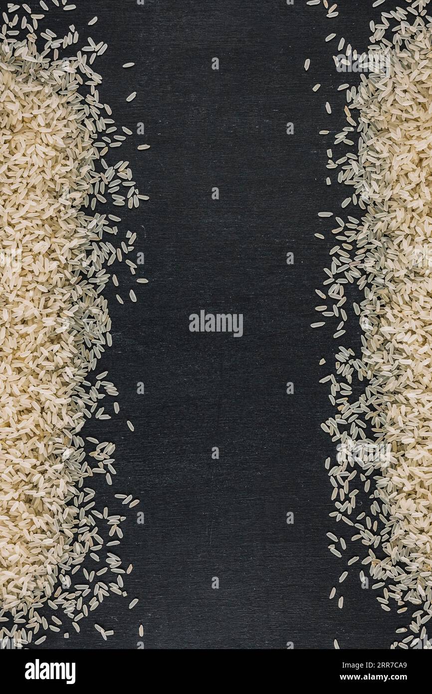 Two piles white rice Stock Photo - Alamy