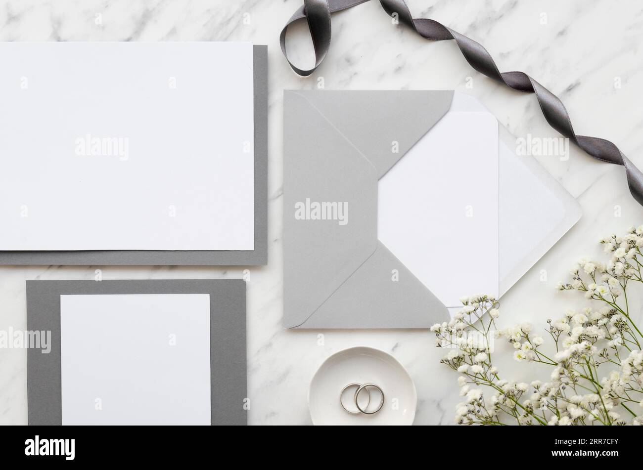 Wedding invitation card with ribbon Stock Photo - Alamy