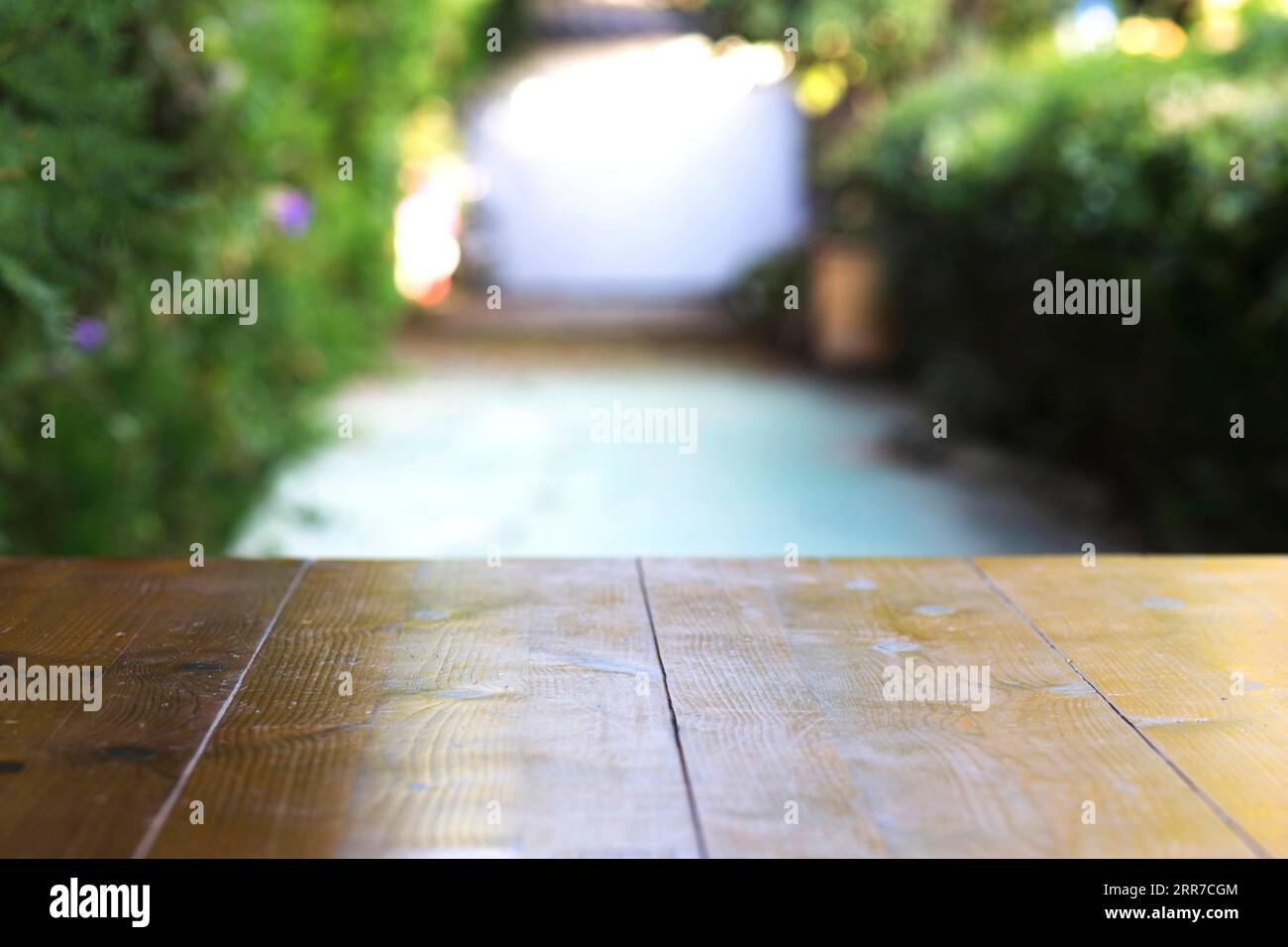 Wooden table park alley Stock Photo - Alamy