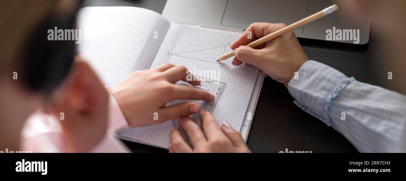 Woman girl taking notes Stock Photo - Alamy