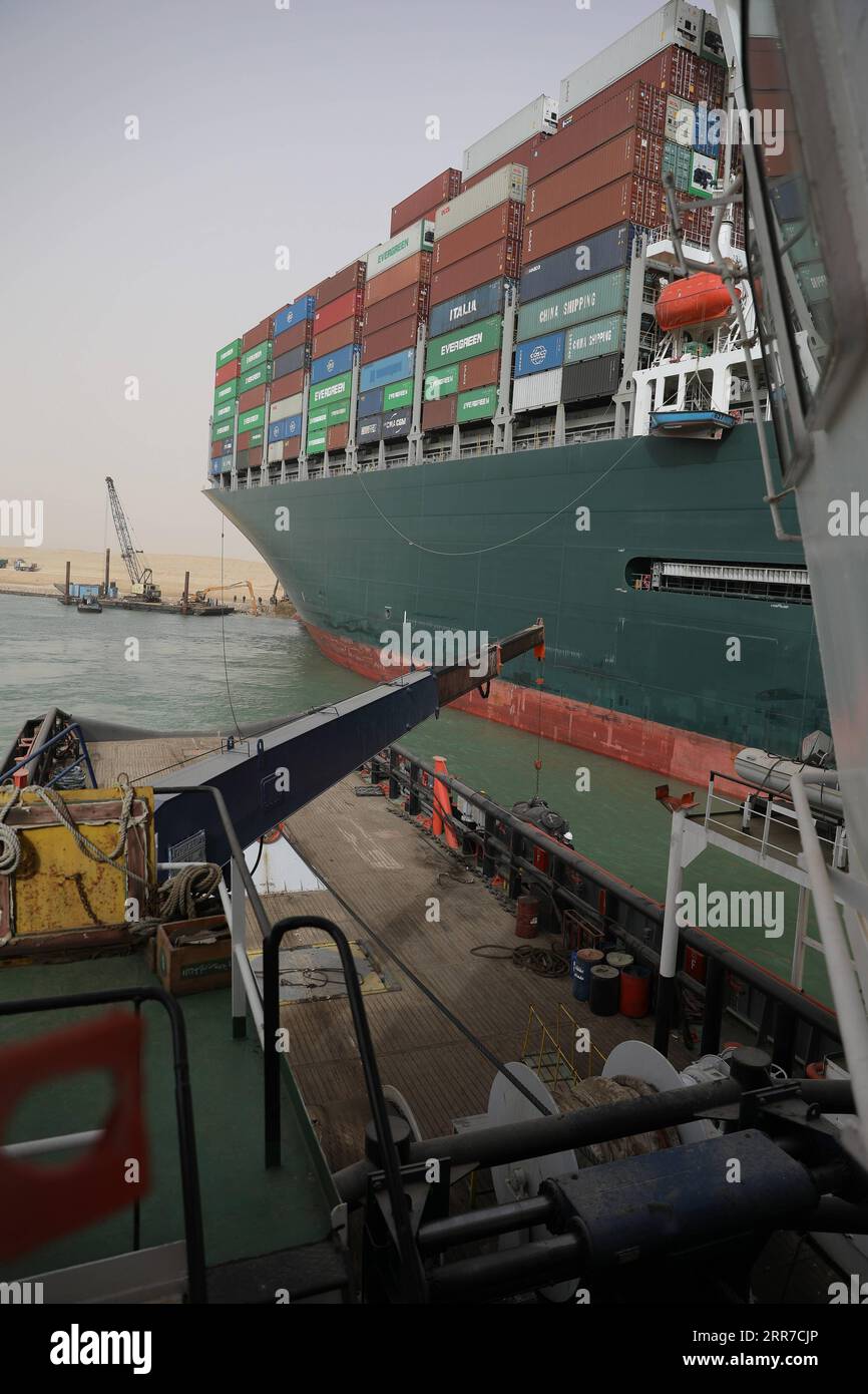 210325 -- CAIRO, March 25, 2021 -- A rescue vessel works at the site of ...