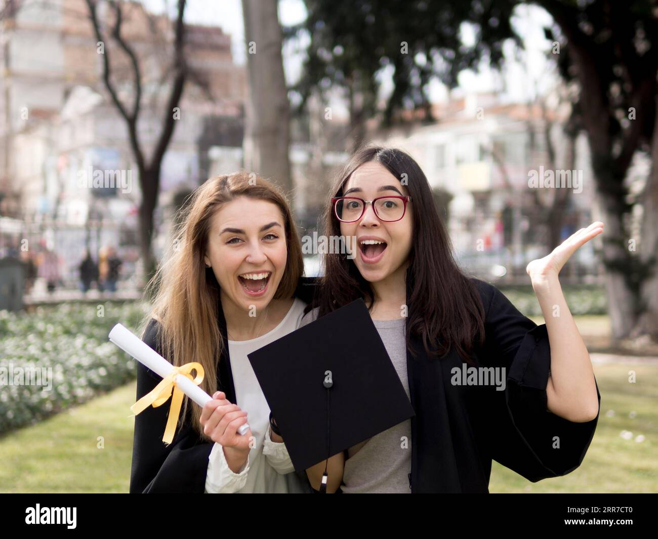 Best friends graduation ceremony Stock Photo - Alamy