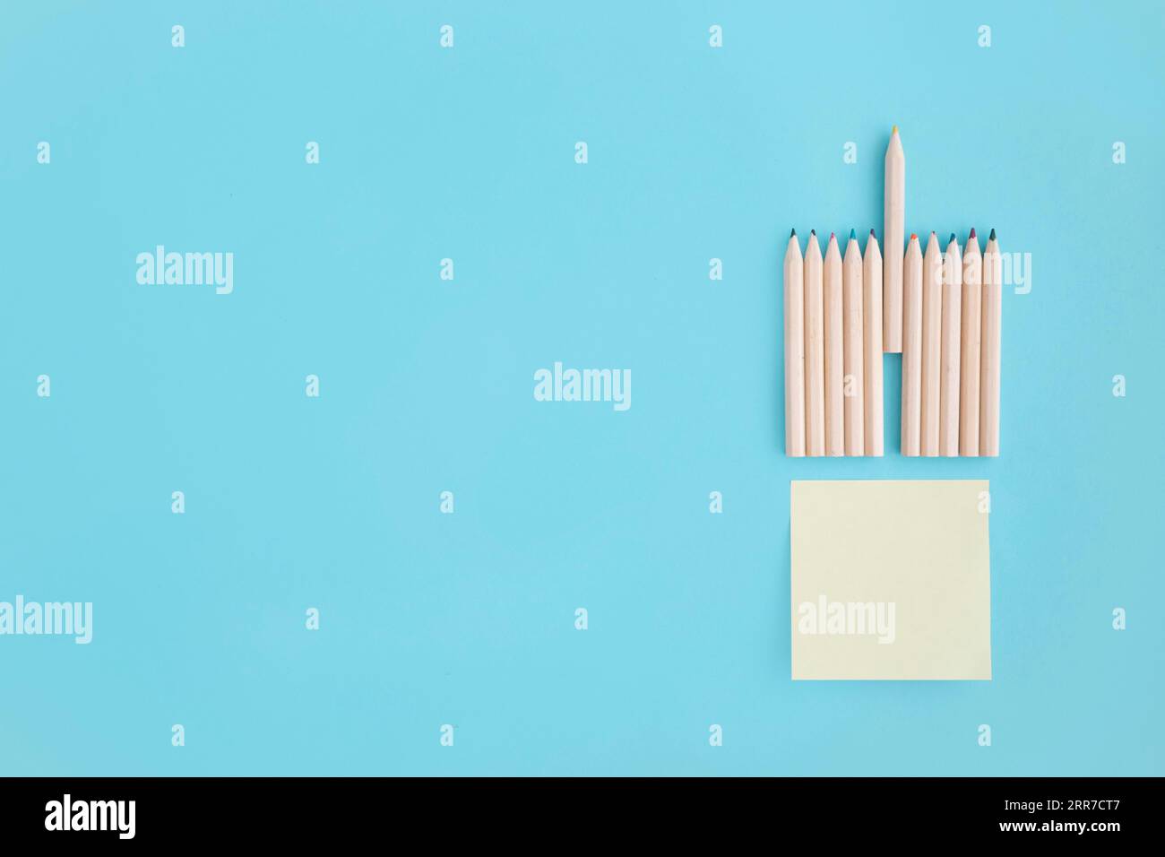 Blank sticky note with rows colored pencil blue background Stock Photo ...