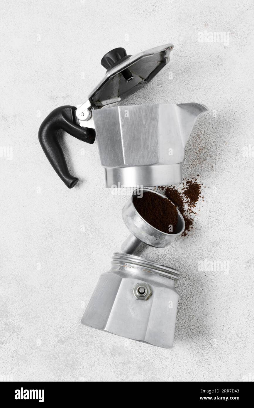 Coffee maker grinder with coffee powder Stock Photo - Alamy