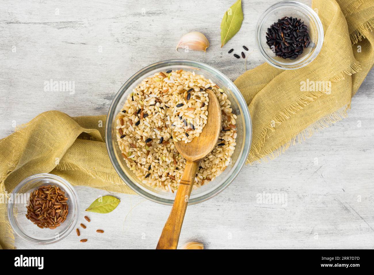 Different rice types bowls with spoon table Stock Photo - Alamy