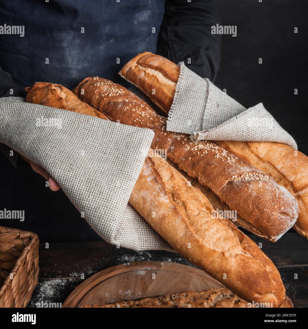 Crusty loaves bread wrapped burlap fabric Stock Photo - Alamy