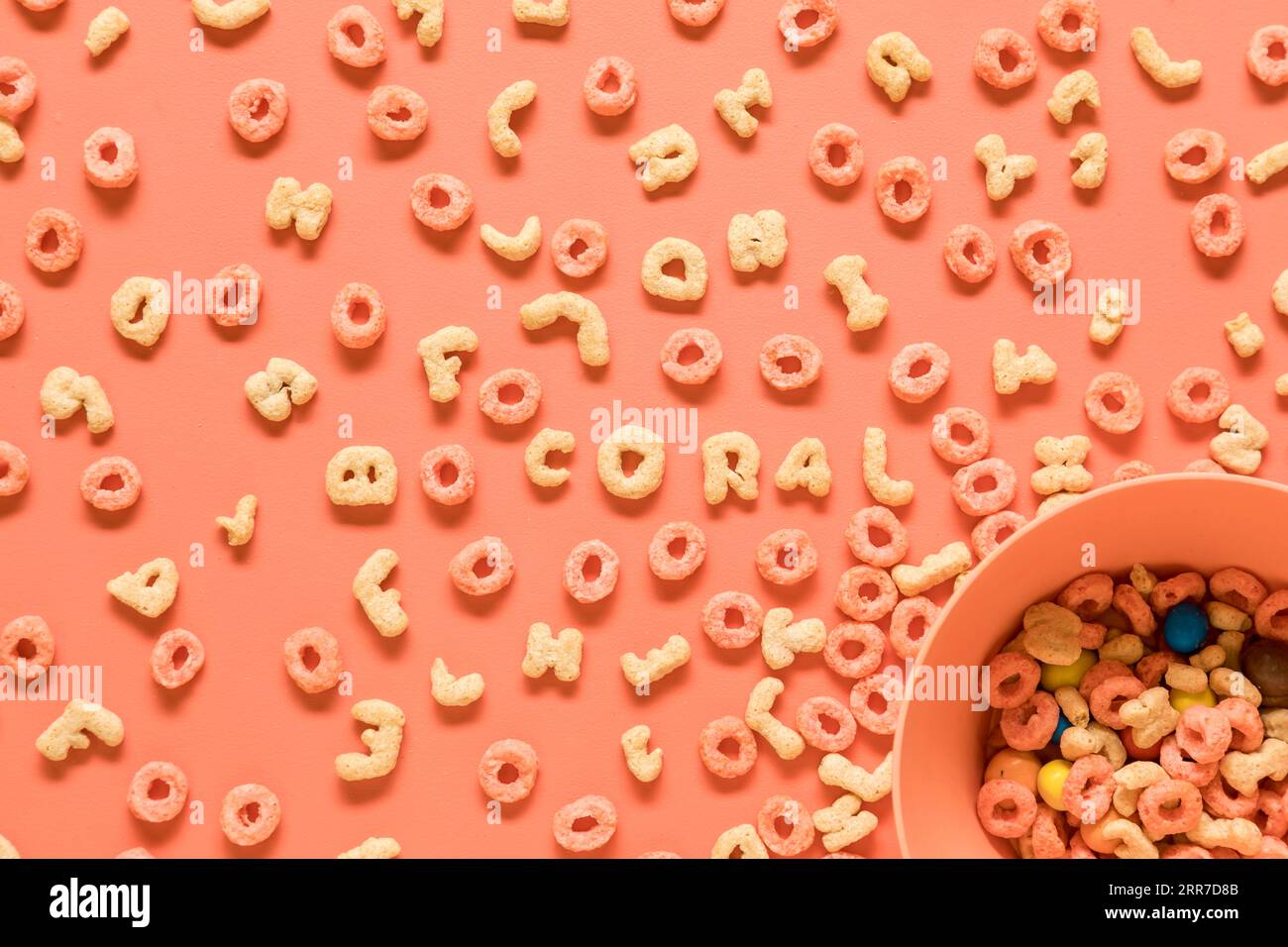 Edible letters alphabet bowl orange background Stock Photo - Alamy