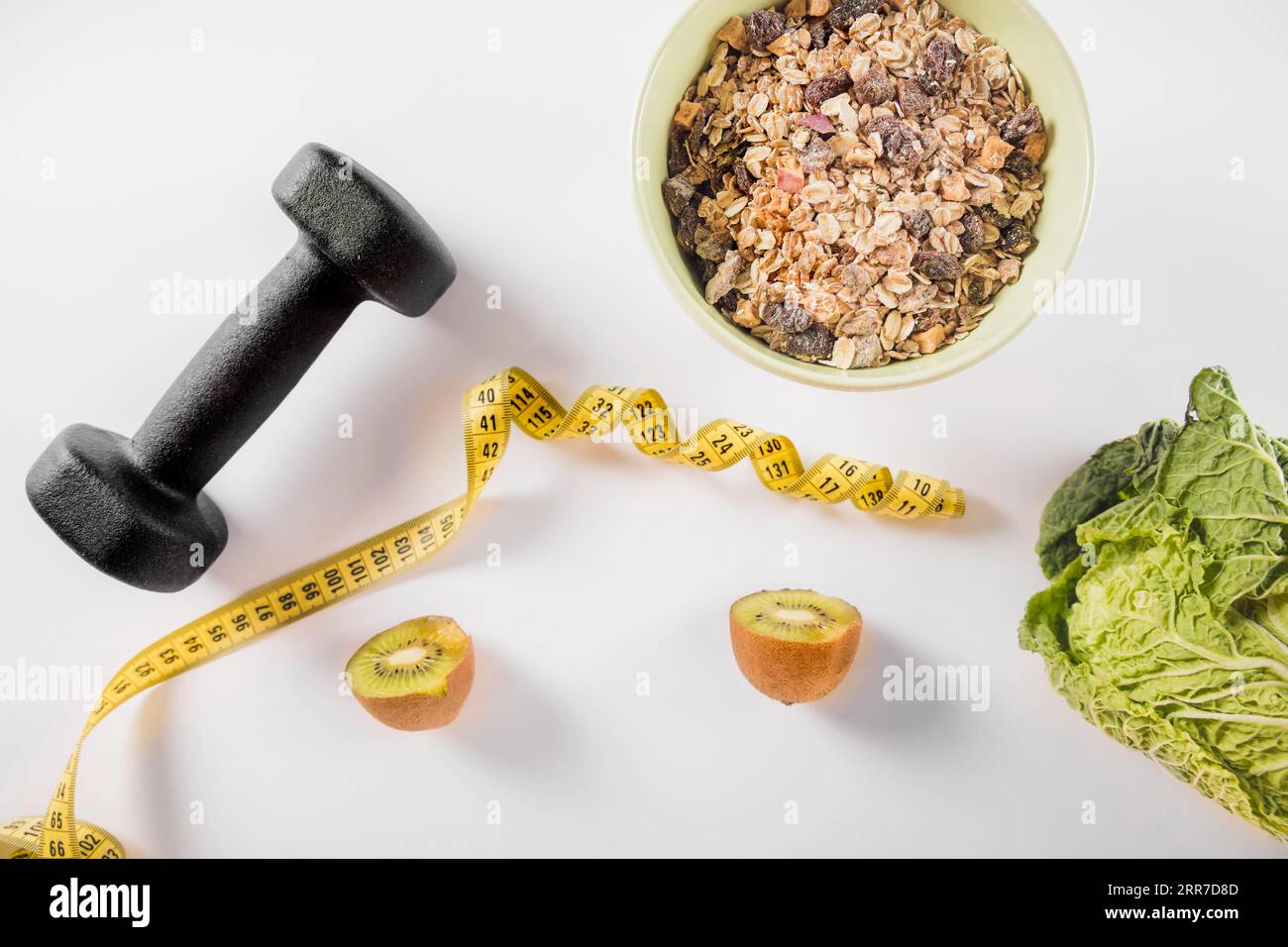 Diet food with dumbbell measuring tape white background Stock Photo - Alamy