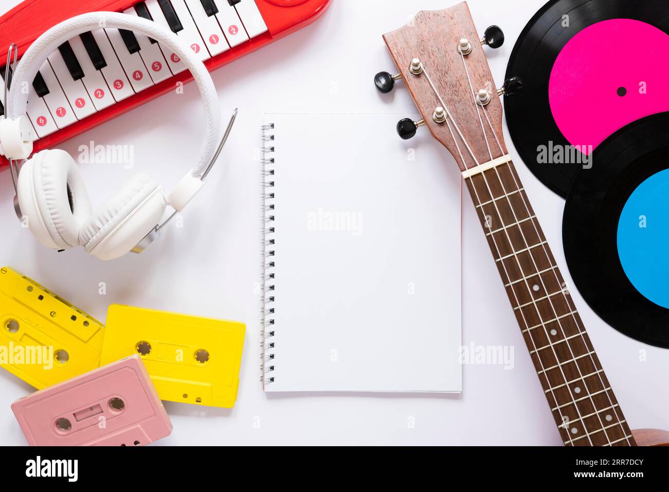 Flat lay music concept white background Stock Photo - Alamy