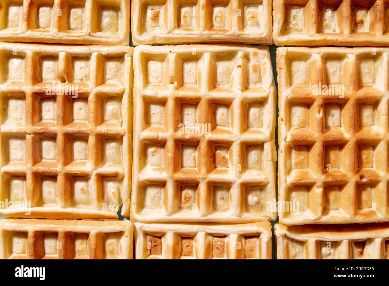 Flat lay arranged waffles with pattern Stock Photo - Alamy