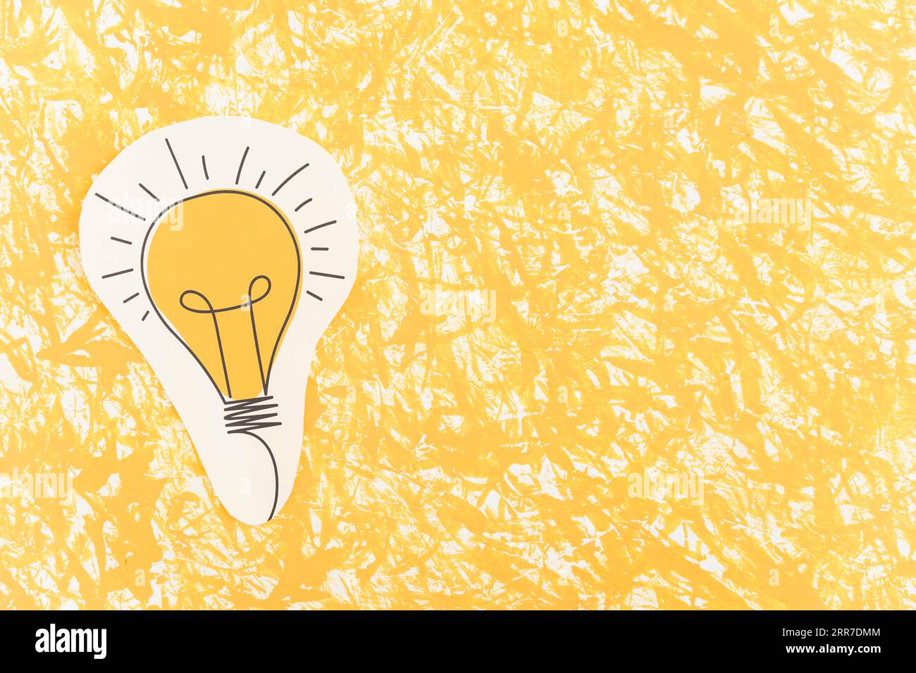 Hand drawn light bulb cut out yellow pattern background Stock Photo - Alamy