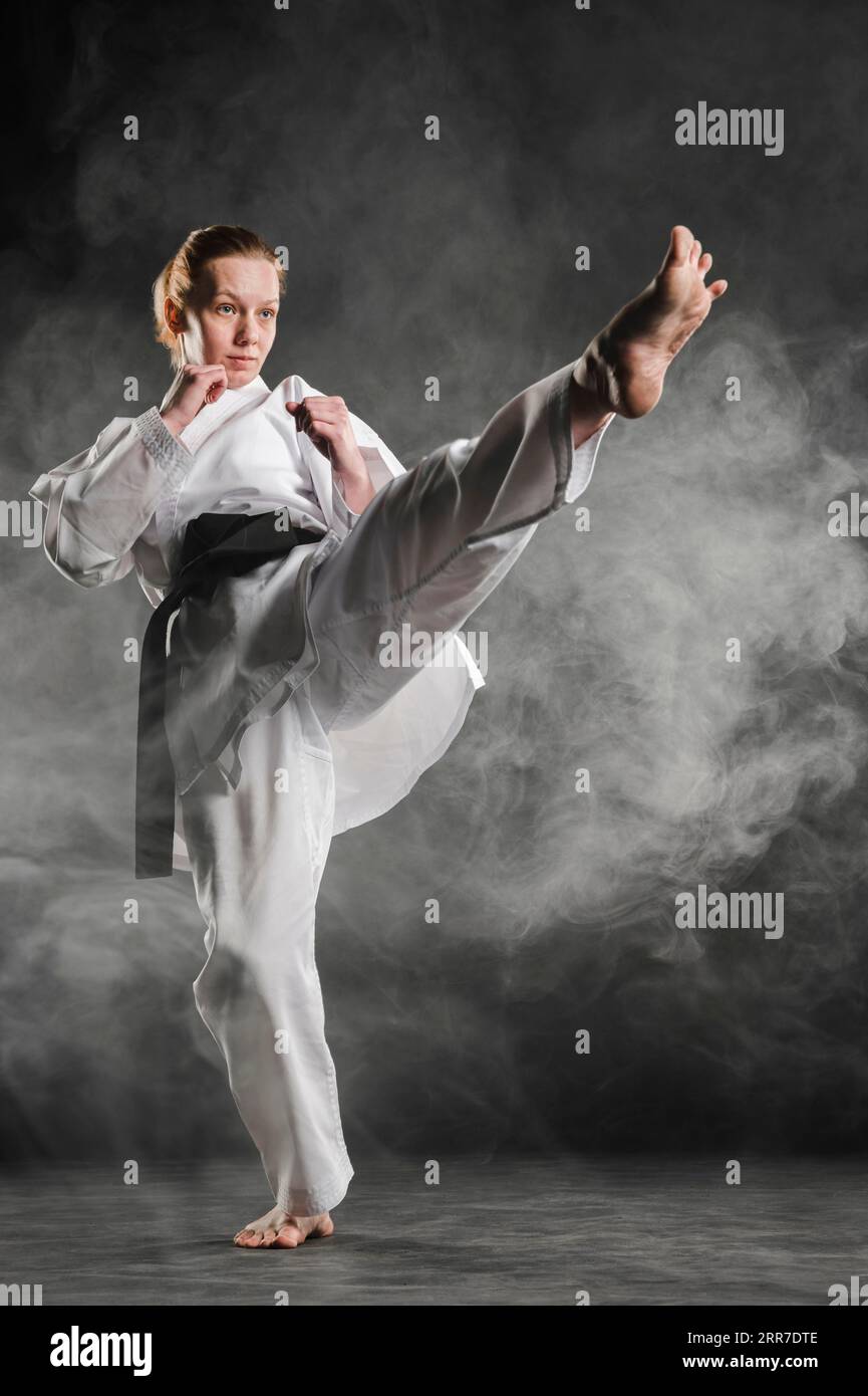 Karate woman action Stock Photo - Alamy