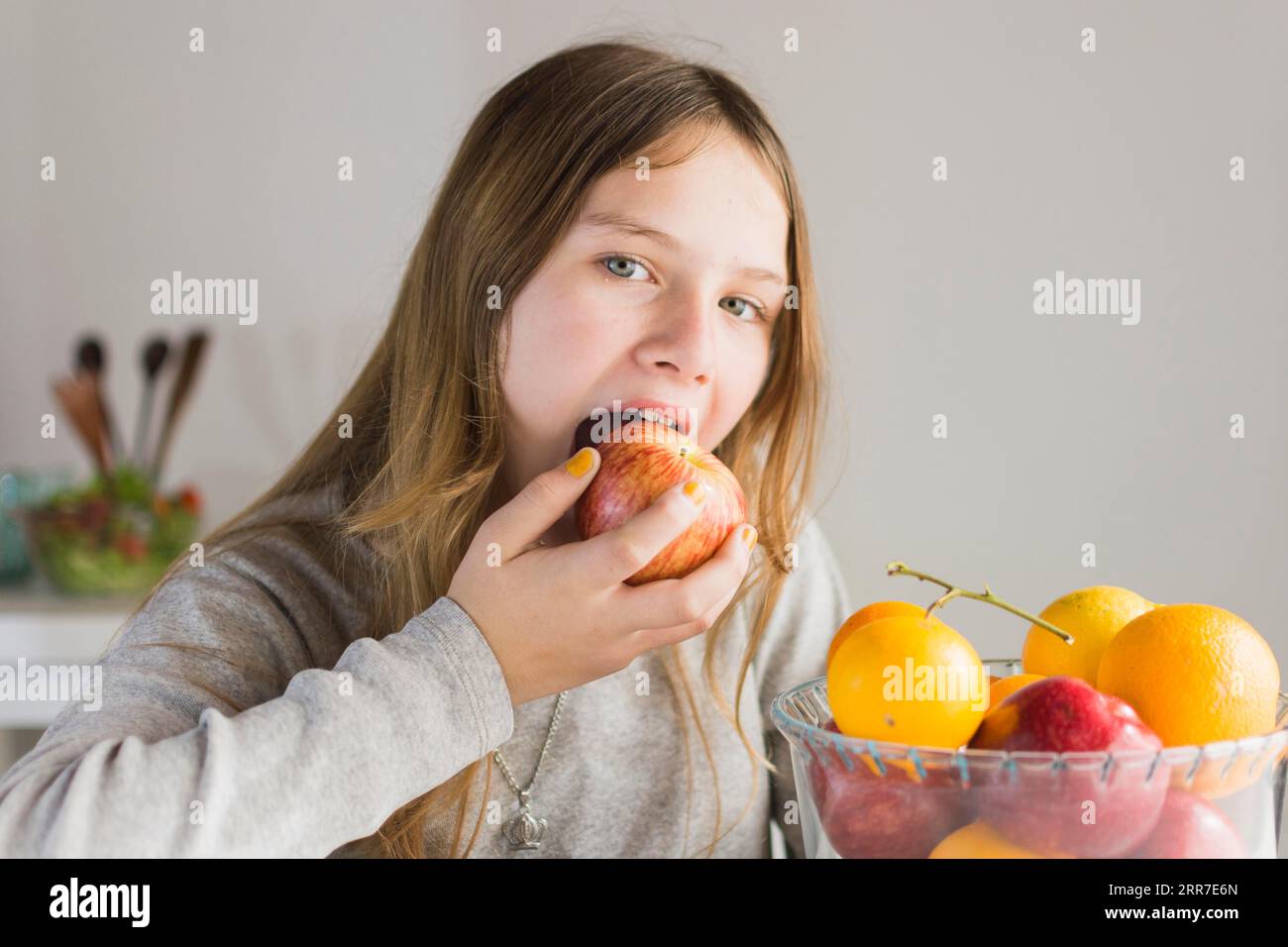 Mouth eating apple hi-res stock photography and images - Alamy