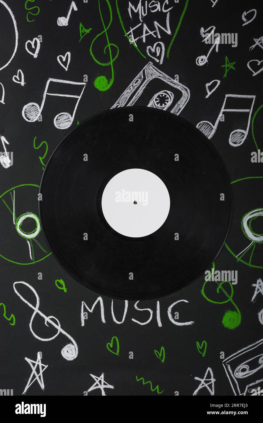 Vinyl record blackboard with drawn musical notes Stock Photo - Alamy