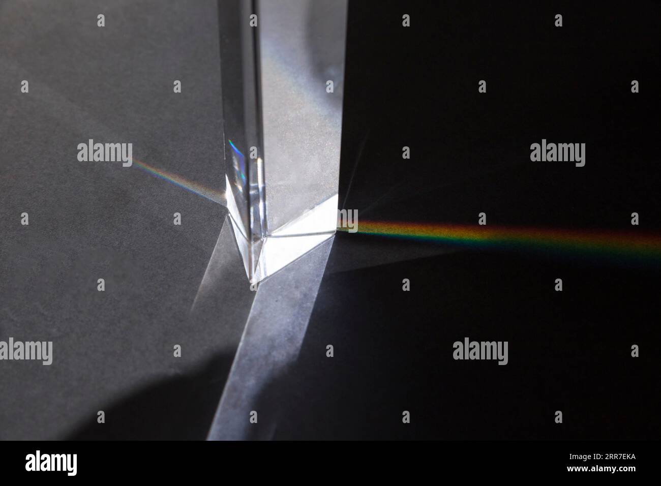 Transparent prism with rainbow Stock Photo - Alamy