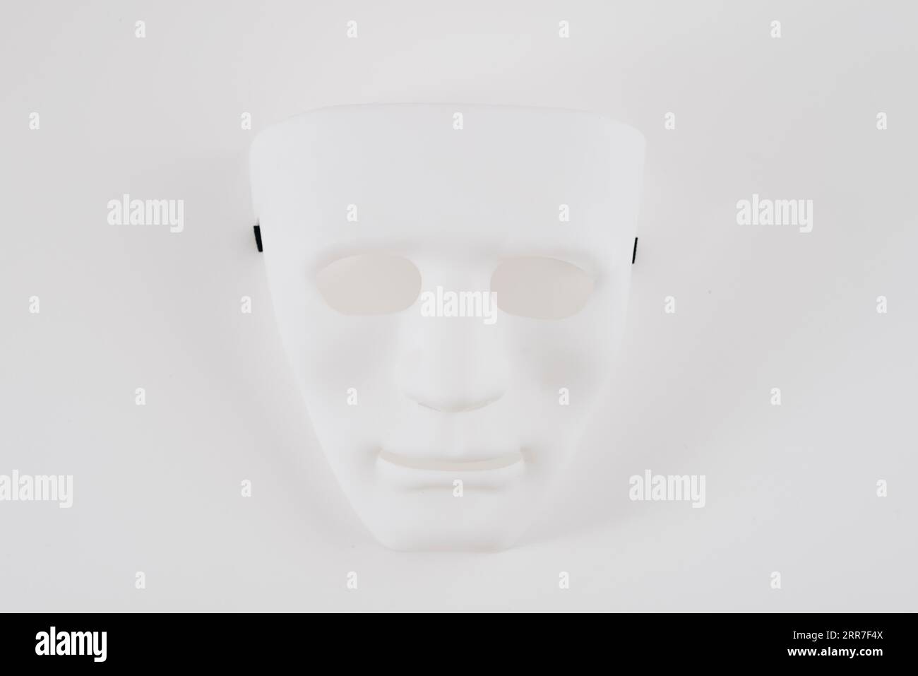 Big white carnival mask table Stock Photo - Alamy