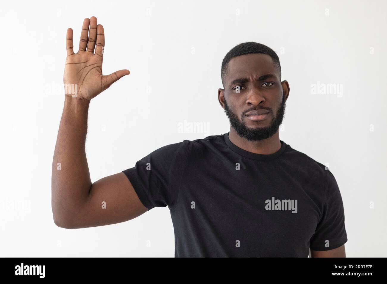 Black person waving with his hand Stock Photo - Alamy