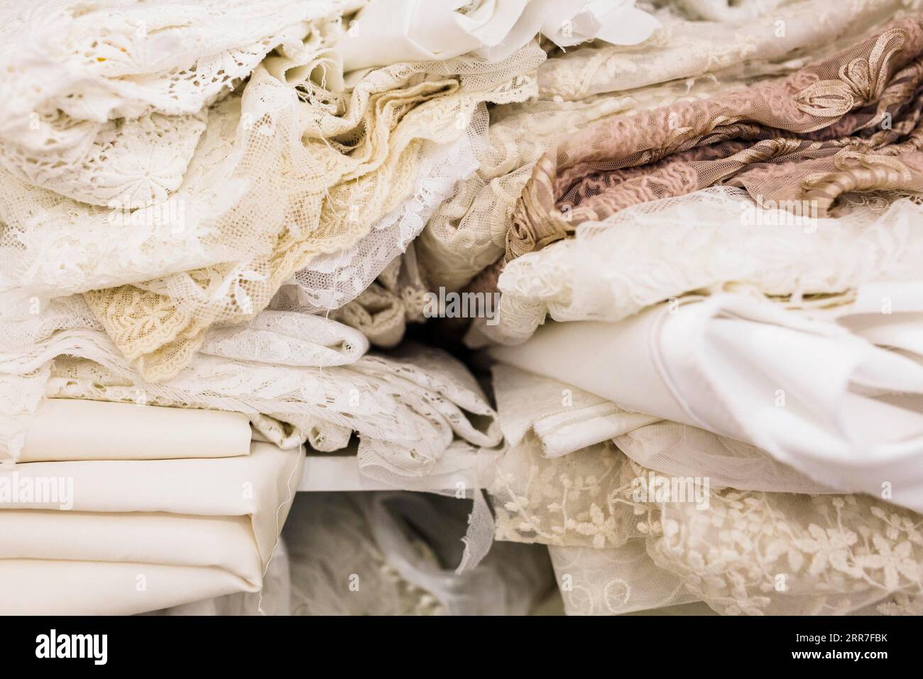 Close up various lace fabrics tailor shop Stock Photo - Alamy