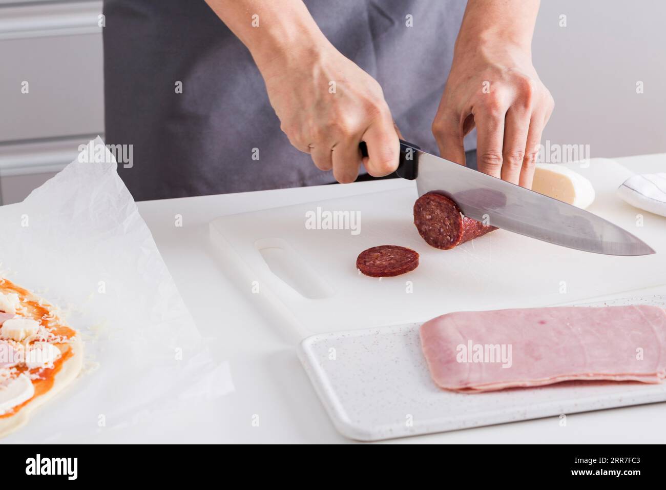 Close up hand cutting slice hi-res stock photography and images - Alamy
