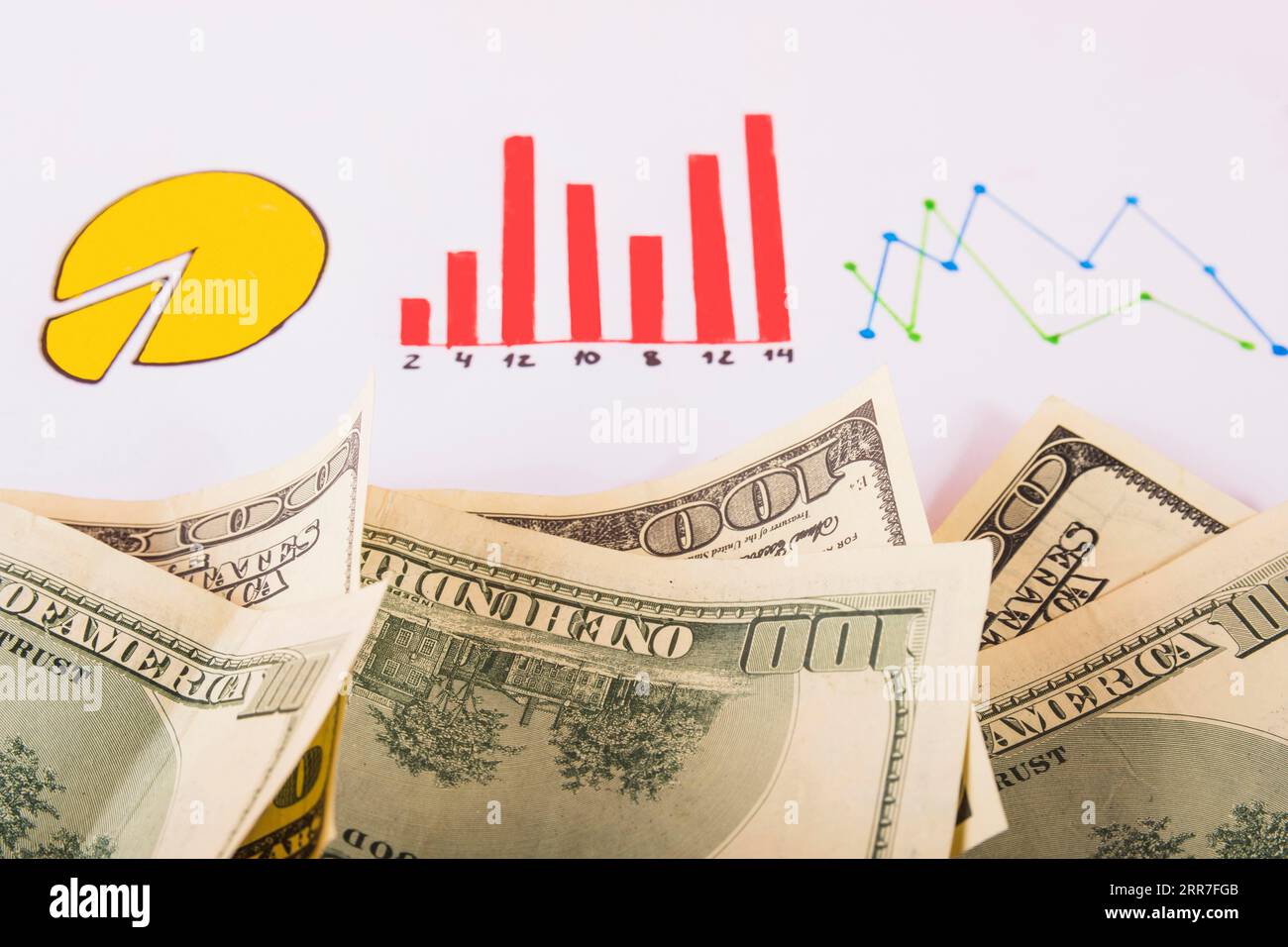 Diagrams with money table Stock Photo - Alamy