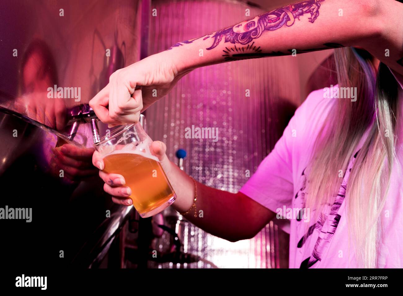 Person filling glass hi-res stock photography and images - Alamy