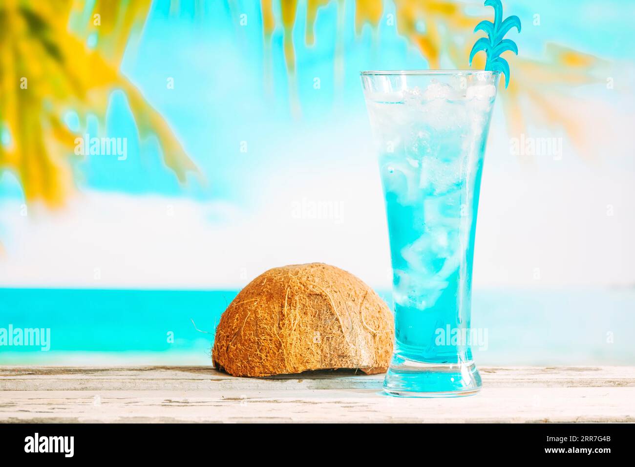 Glass cooling blue drink inverted coconut shell Stock Photo - Alamy