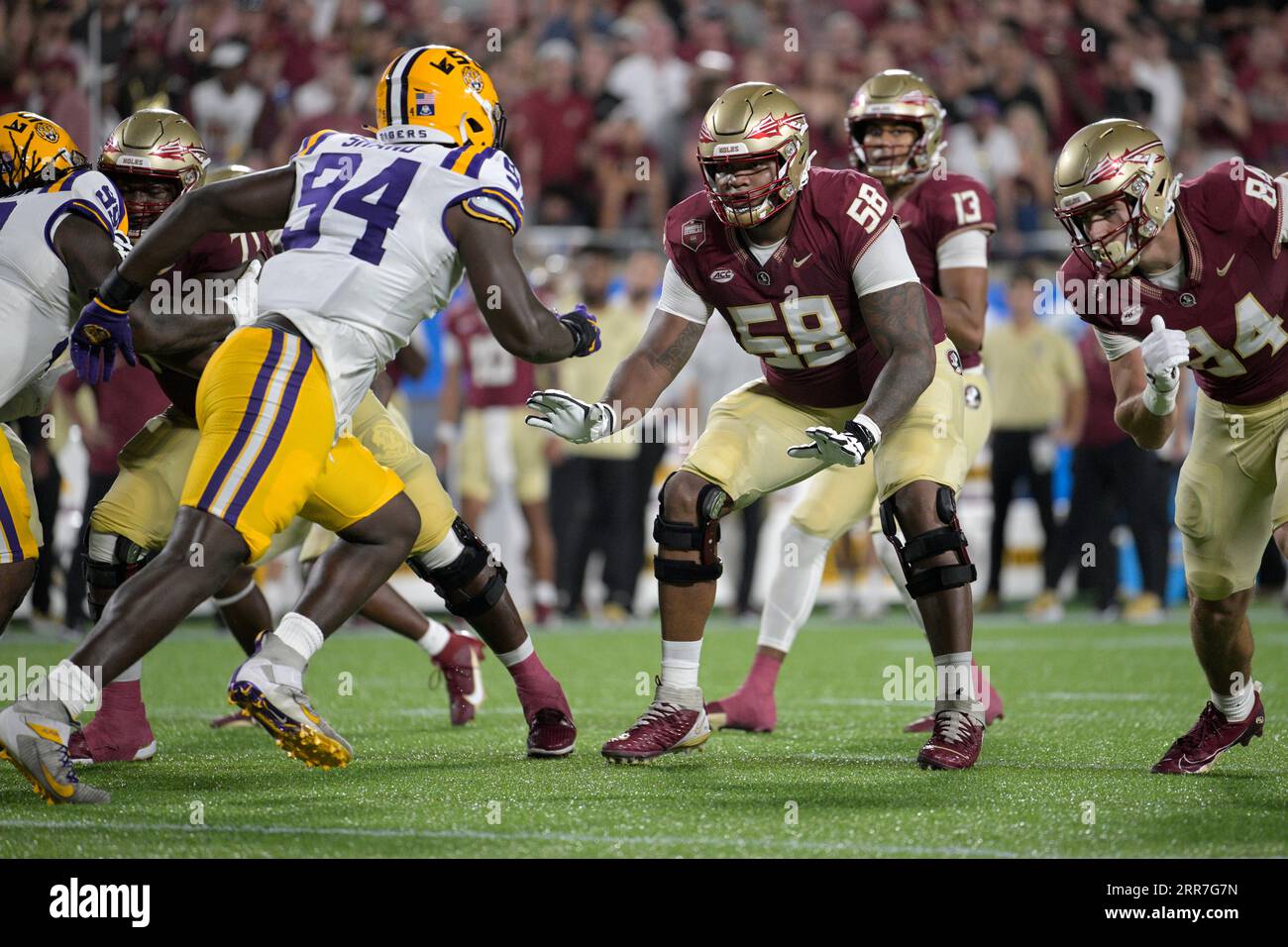 Florida State offensive lineman Bless Harris (58) sets up to block in ...