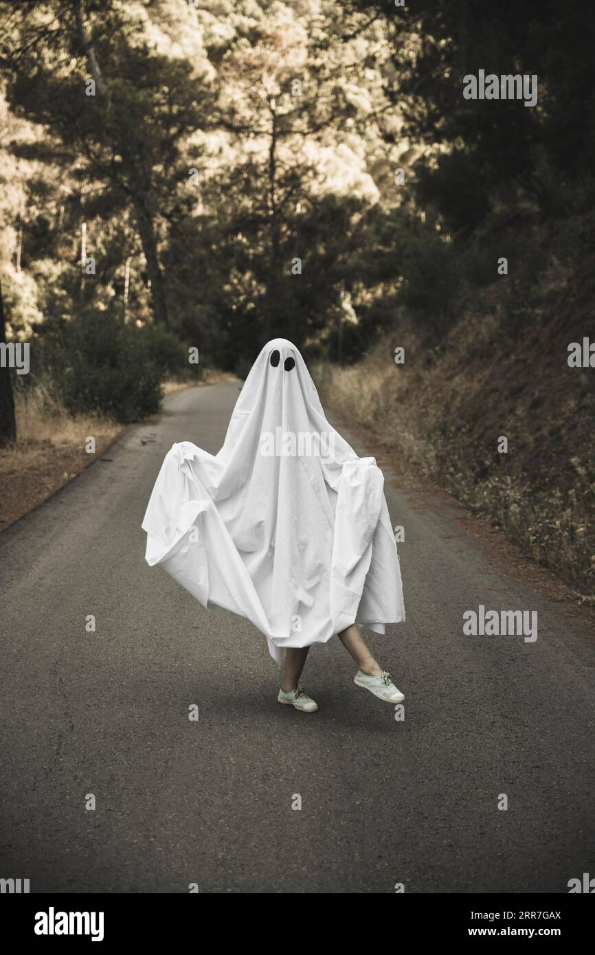 Human ghost suit posing countryside route Stock Photo - Alamy