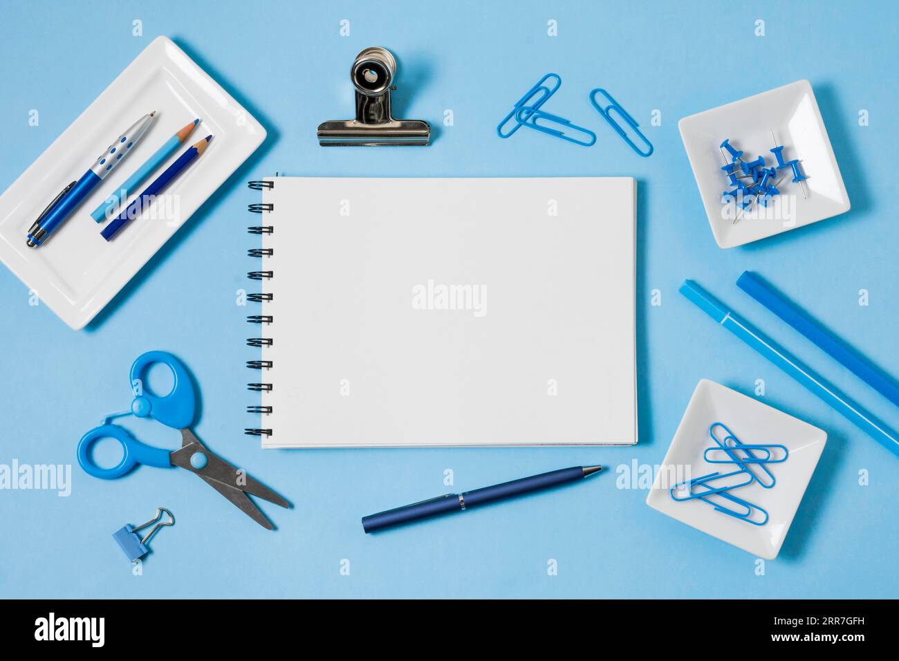 Notebook paper clips arrangement Stock Photo - Alamy