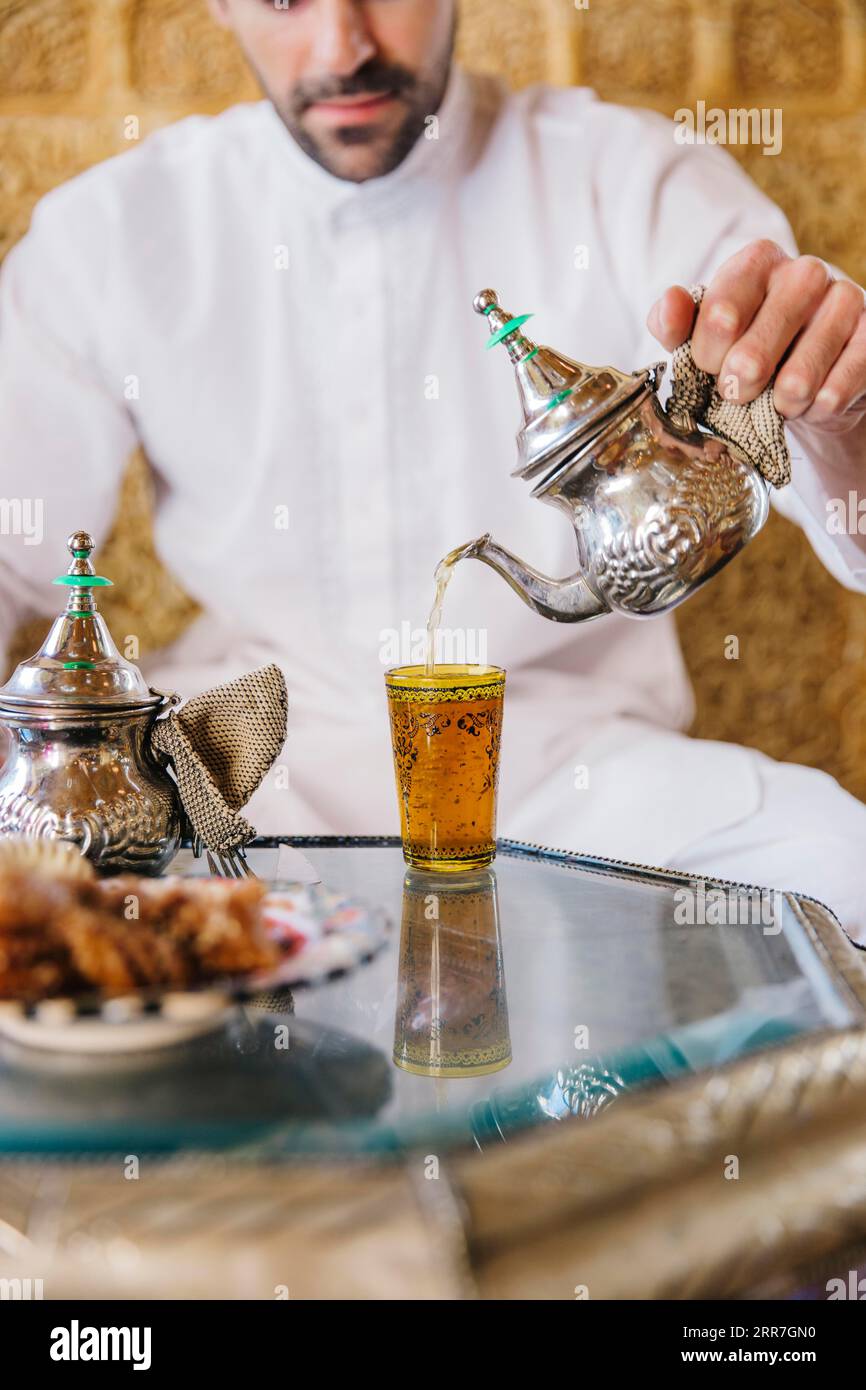Muslim man arab restaurant Stock Photo - Alamy