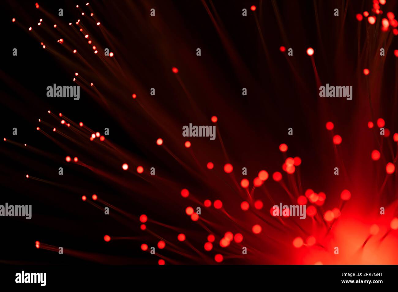 Red fiber lights with defocused spots Stock Photo - Alamy
