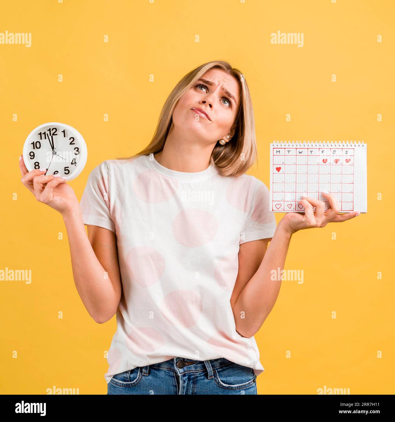 Shocked woman looking up being sad Stock Photo - Alamy