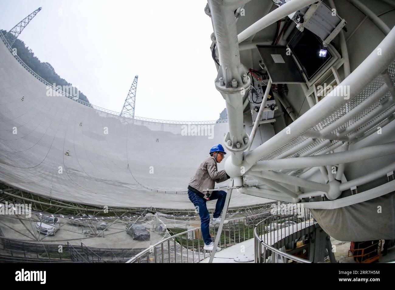210329 -- PINGTANG, March 29, 2021 -- A staff member enters the feed ...