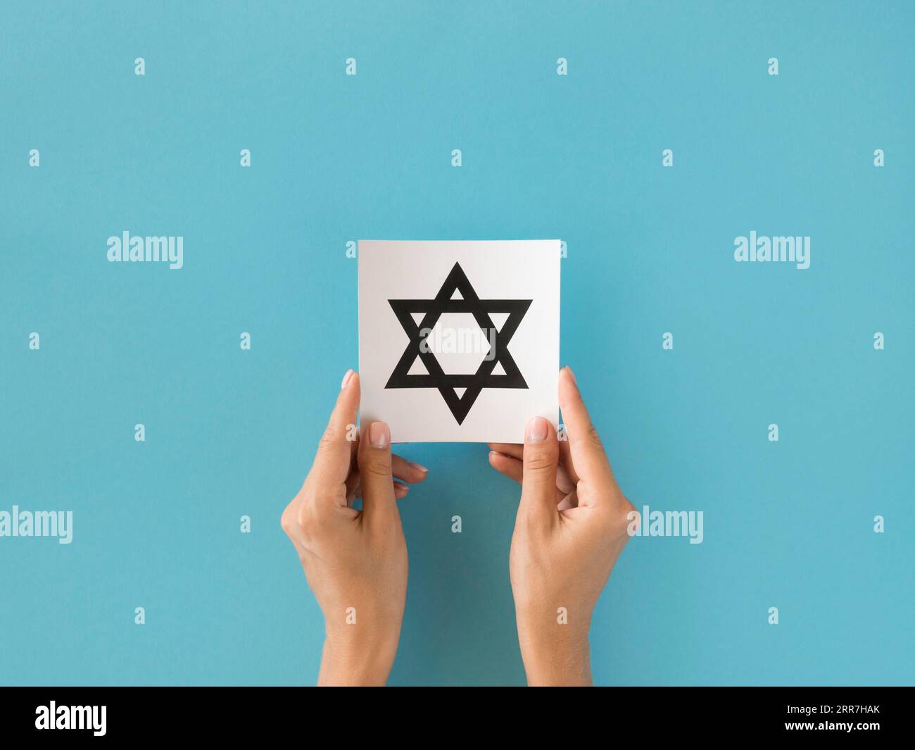 Top view hands holding david s star symbol Stock Photo - Alamy