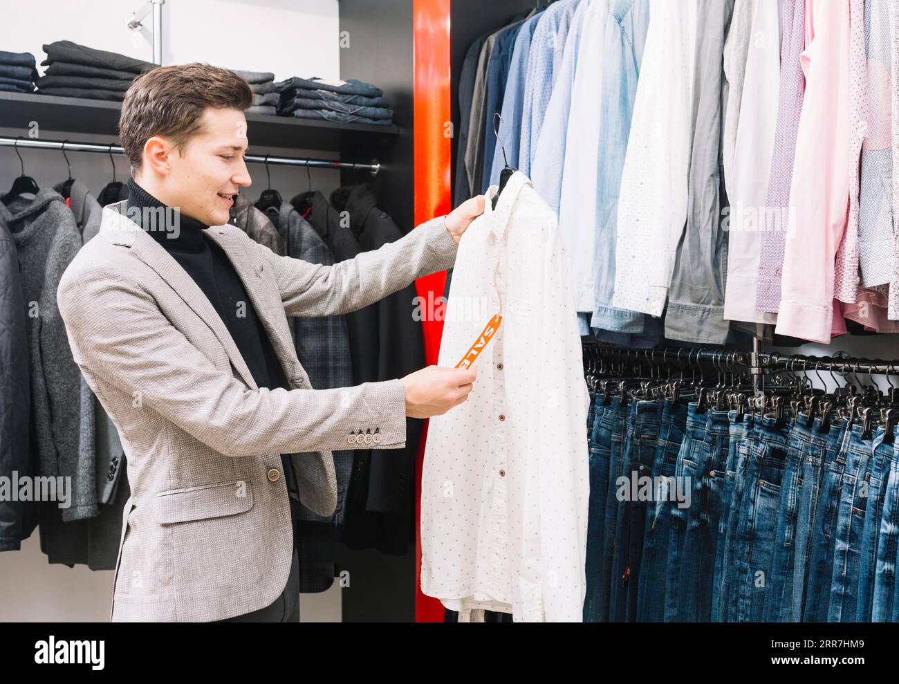 Handsome young man customer checking hi-res stock photography and ...