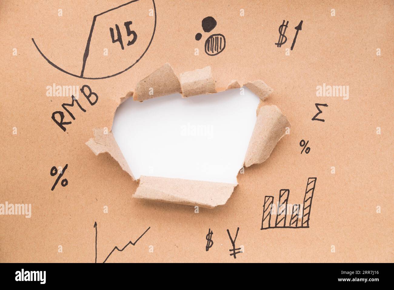 Broken paper with symbols Stock Photo - Alamy