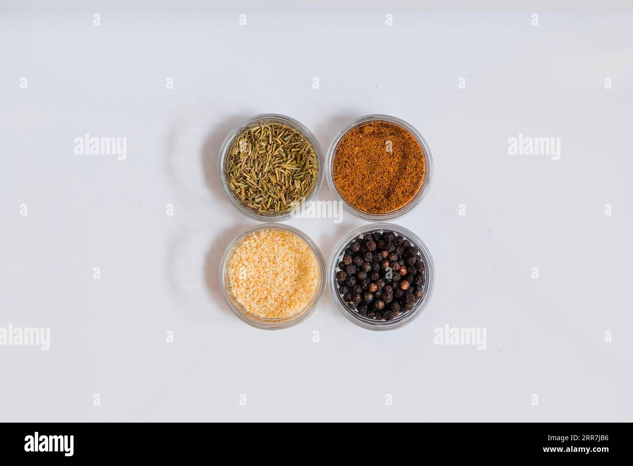 Four bowls with spices Stock Photo - Alamy