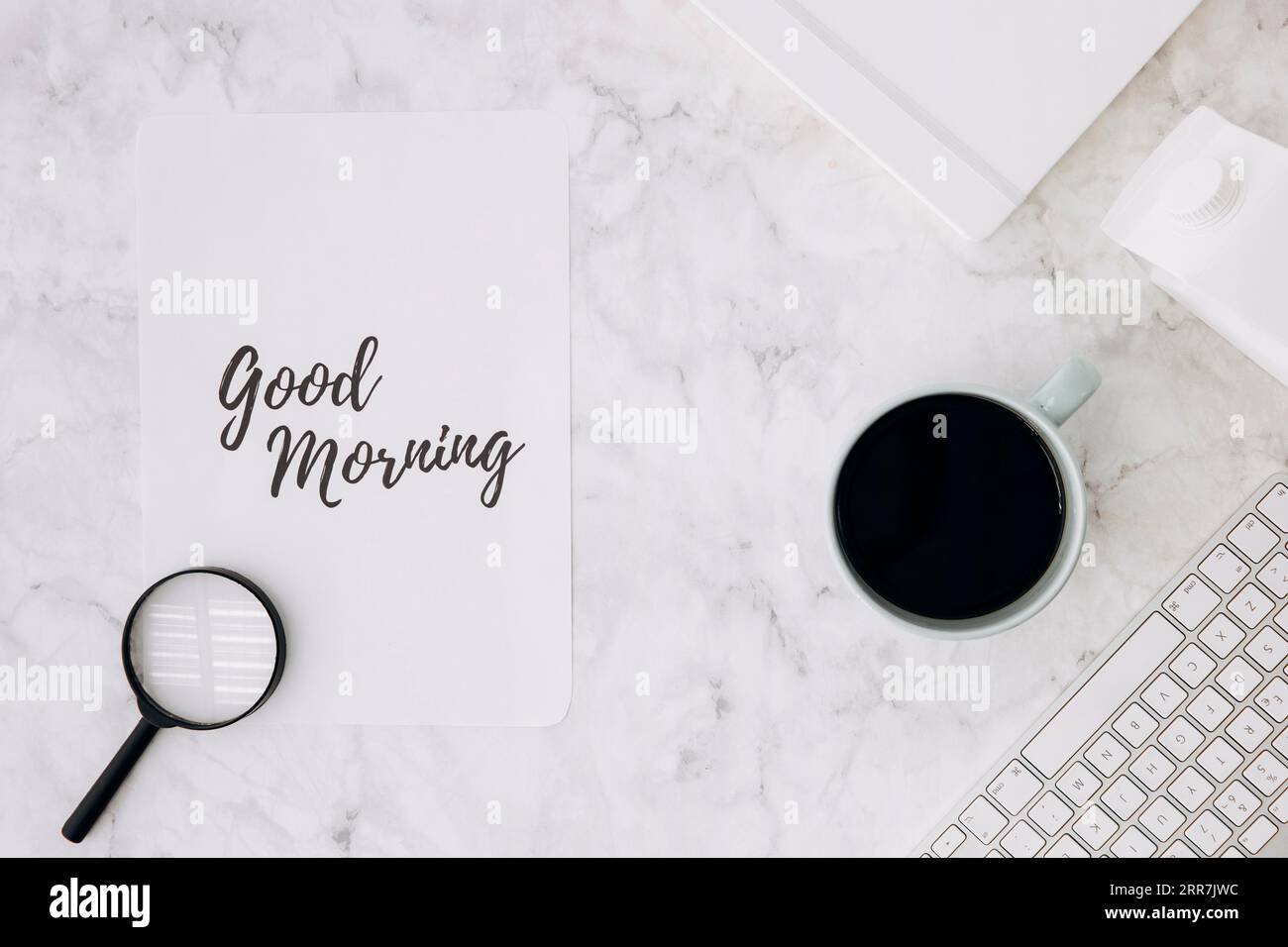 Magnifying glass good morning paper with coffee cup diary keyboard ...