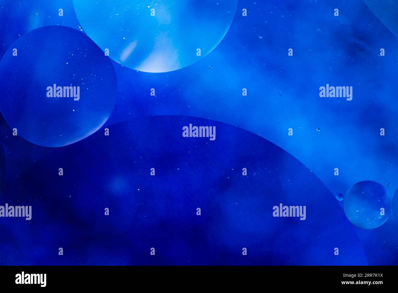 Mixing water oil coloured liquid abstract background 3 Stock Photo - Alamy