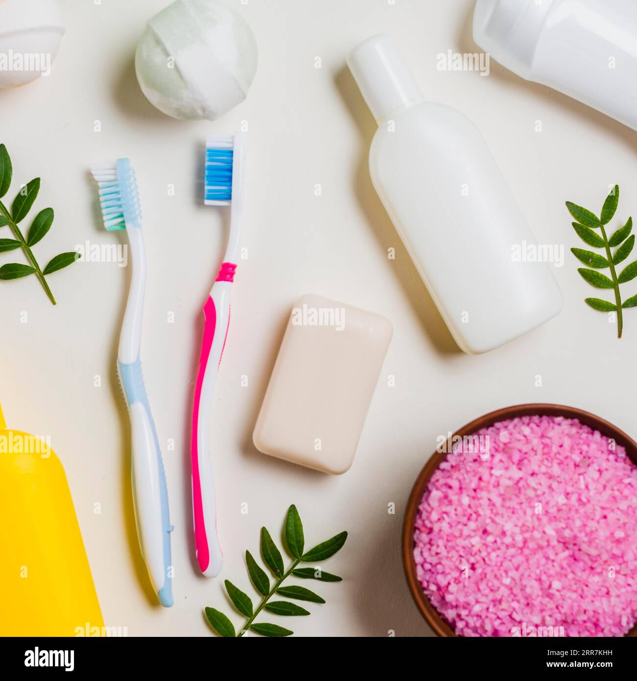 Toothbrush soap bath bomb pink salt cosmetics products white background ...