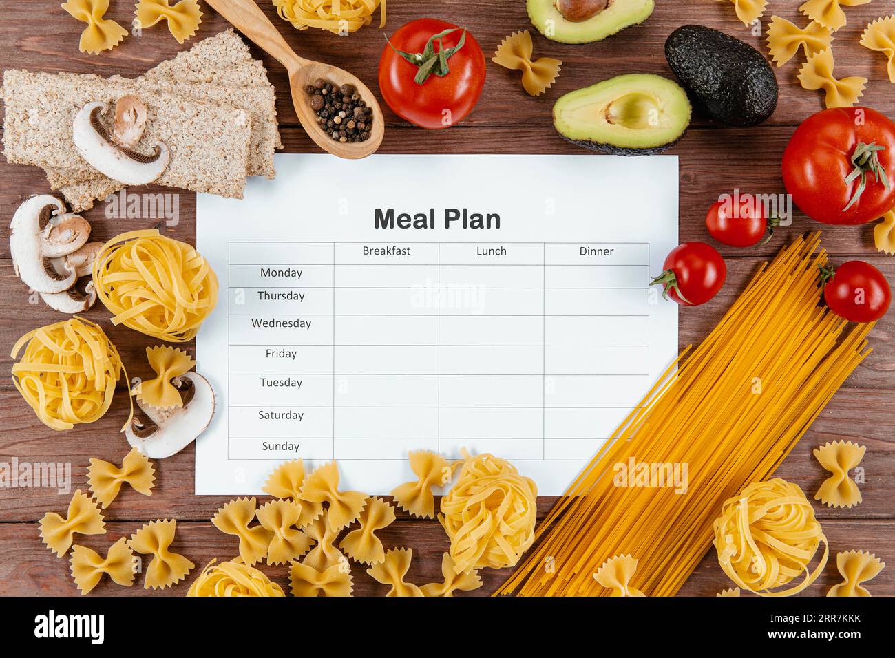 Top view meal plan with pasta avocado Stock Photo - Alamy
