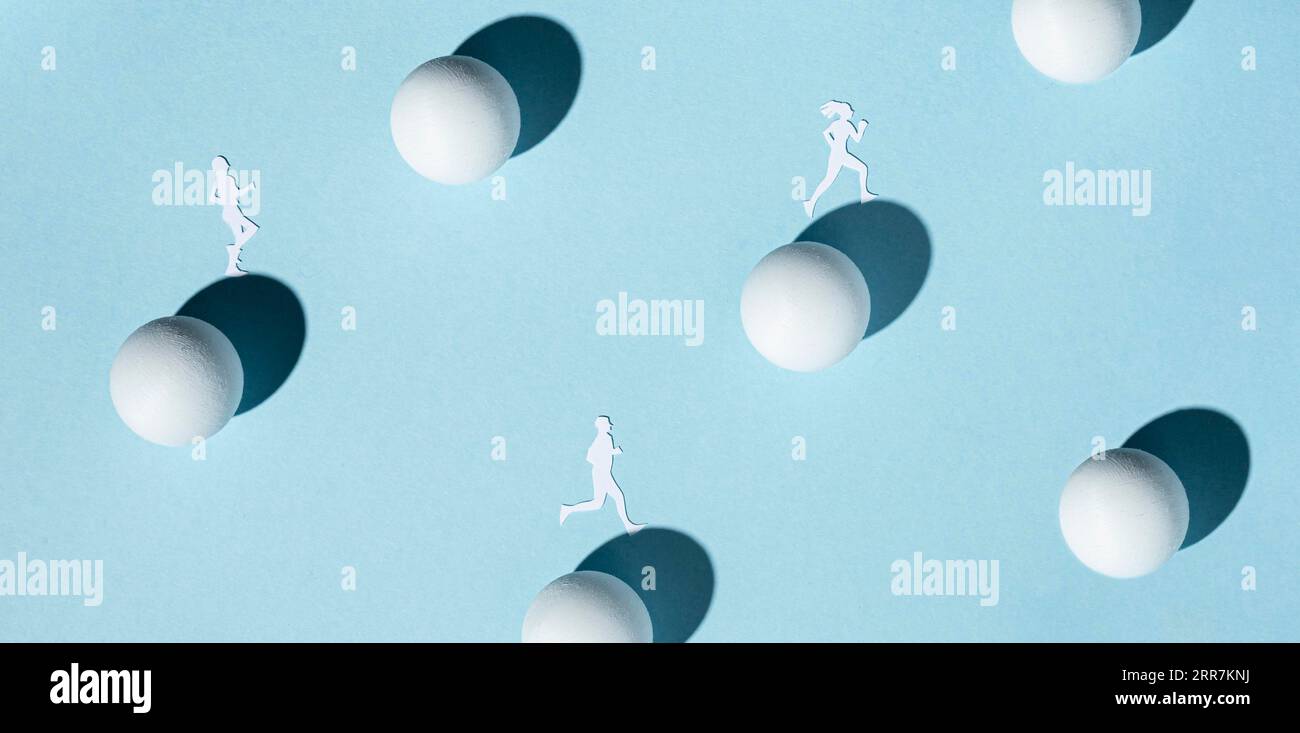 Top view paper athletes with ping pong balls Stock Photo - Alamy