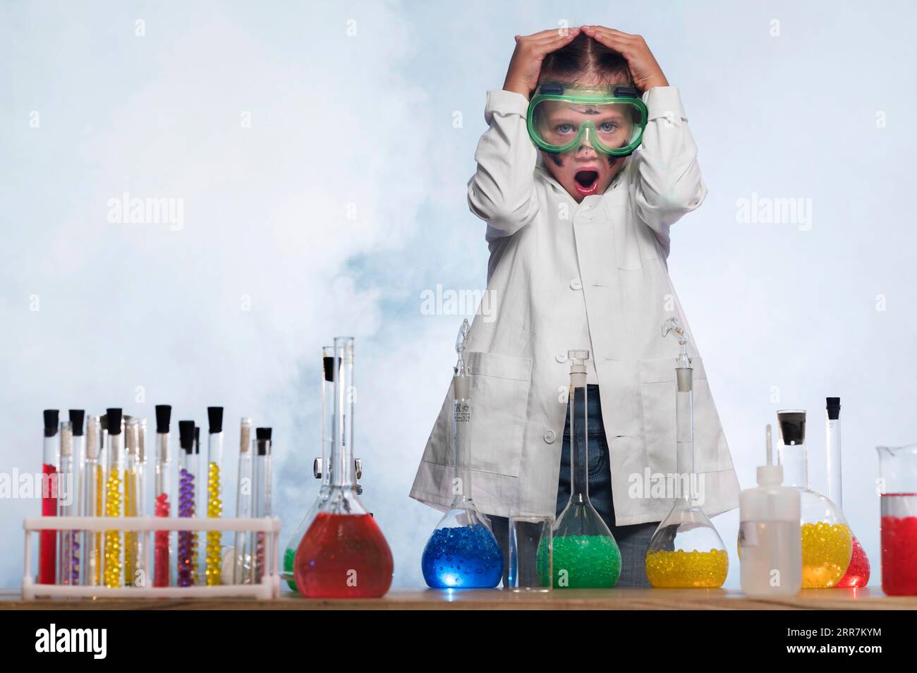 Worried girl science lab Stock Photo - Alamy