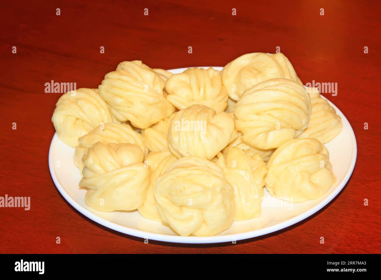 steamed twisted roll Stock Photo - Alamy