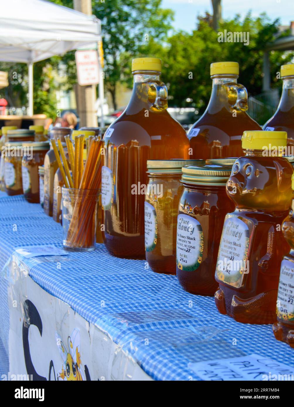 A vertical of jars of local Amish honey on display Stock Photo - Alamy