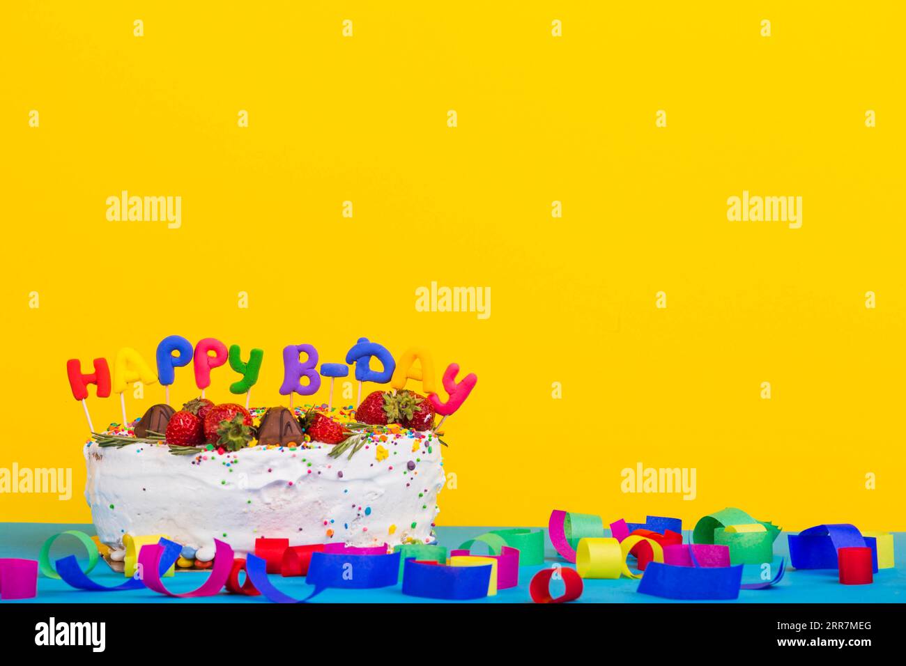 Front view birthday cake with topper Stock Photo - Alamy